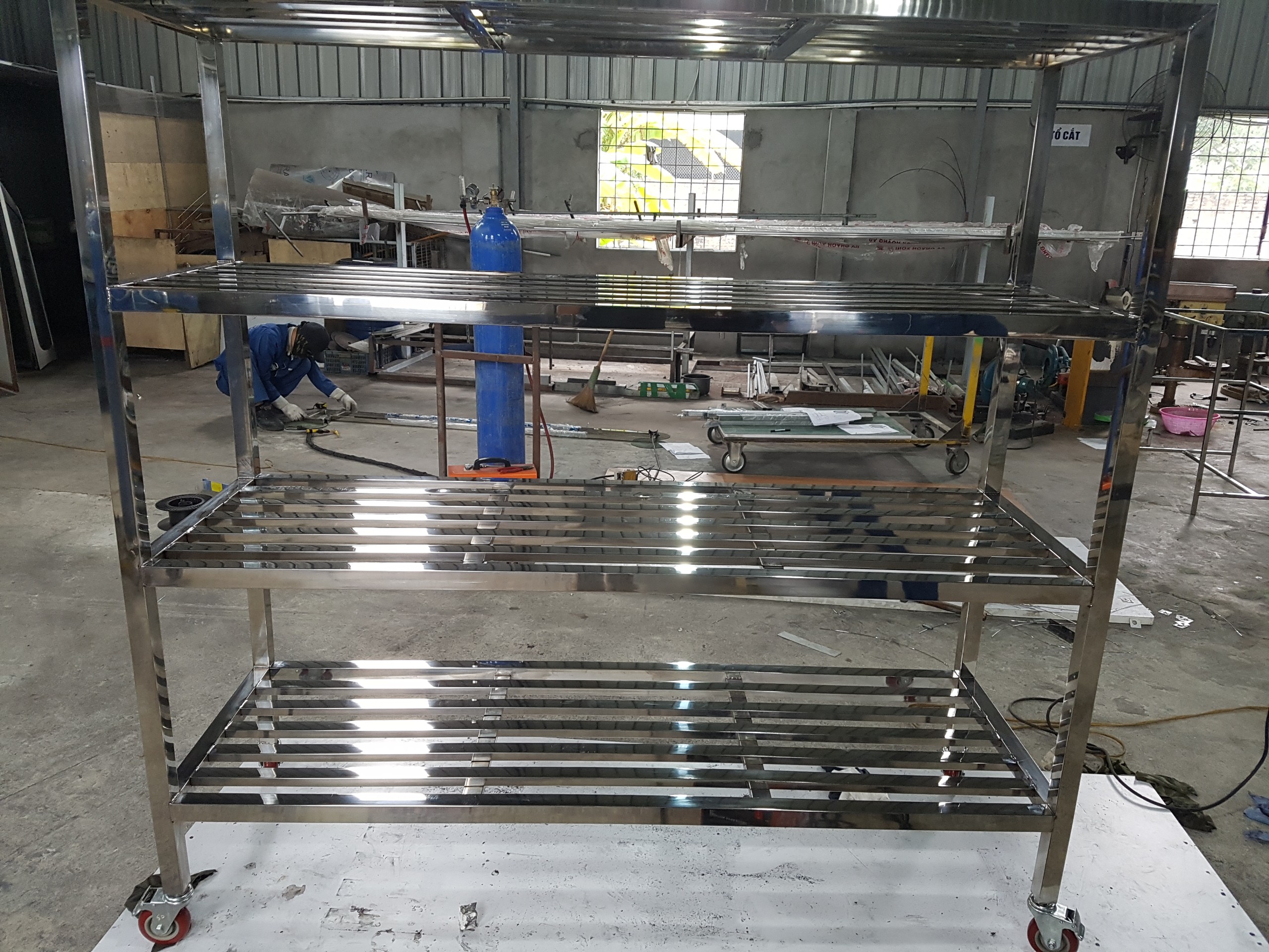 Tủ rack, kệ inox, xe đẩy mặt bàn xoay - bàn thao tác inox